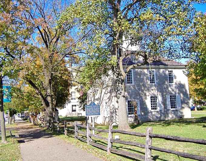 This peaceful historic building in Corydon sits surrounded by mature trees, representing the town's rich heritage and natural beauty.