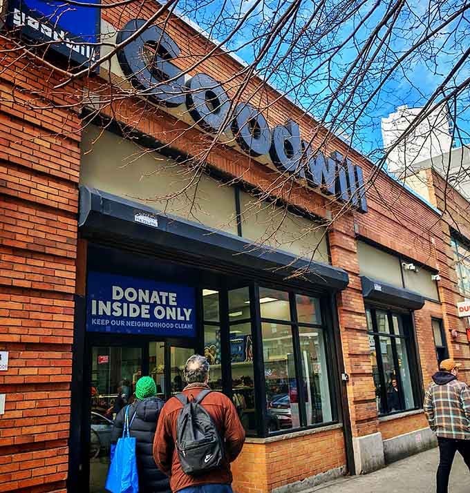 Shoppers browse the entrance as the classic brick building stands ready to reveal its constantly rotating inventory inside.