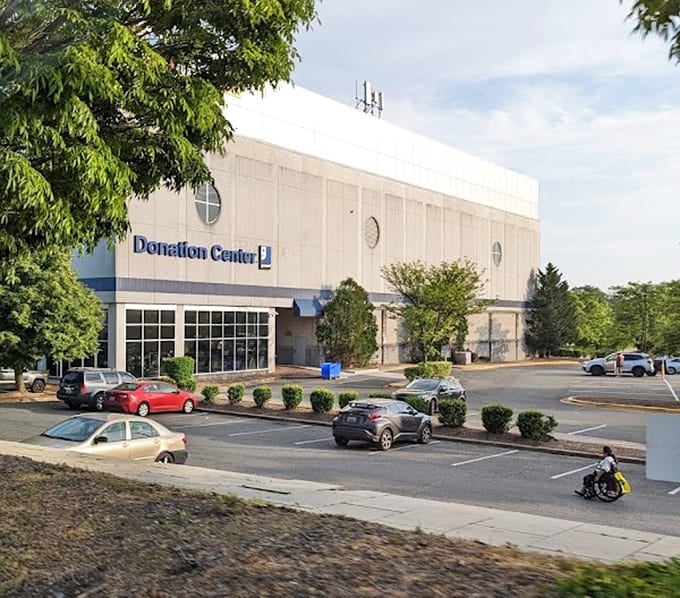 The donation center's clean facade makes giving back look easy, turning clutter into community support with architectural grace.