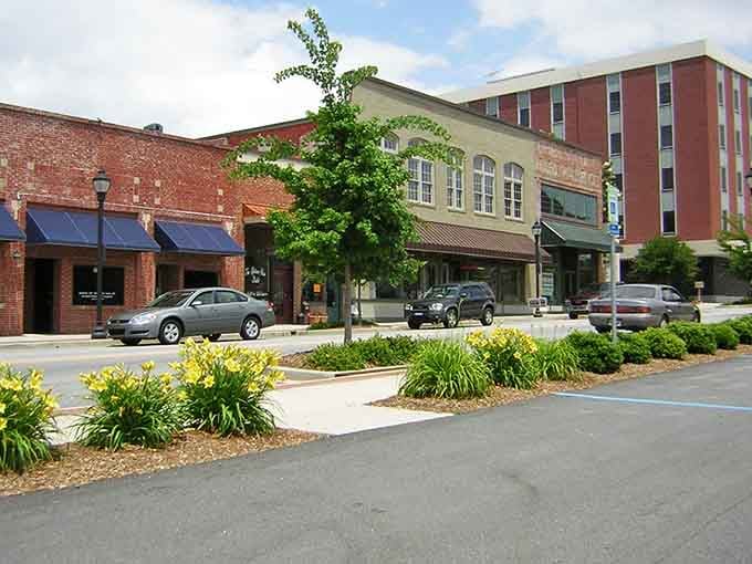 Lush landscaping softens the streetscape where historic buildings house modern conveniences at yesterday's prices.