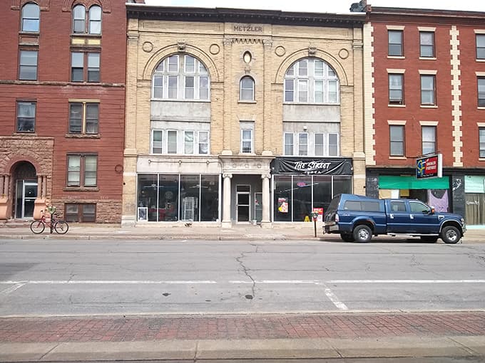 Arched windows and cream-colored facades create elegant symmetry along this historic downtown street that time hasn't forgotten.