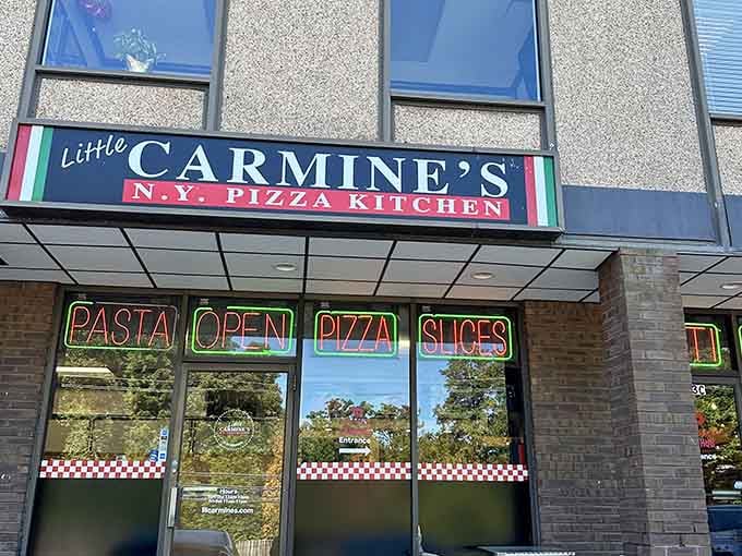 The Italian flag colors frame Little Carmine's entrance like a portal to pizza heaven. Sometimes the best NY slice is found in Maryland!