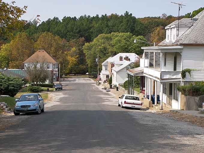 This shaded residential street whispers rather than shouts, inviting you to slow down and remember what tranquility feels like.