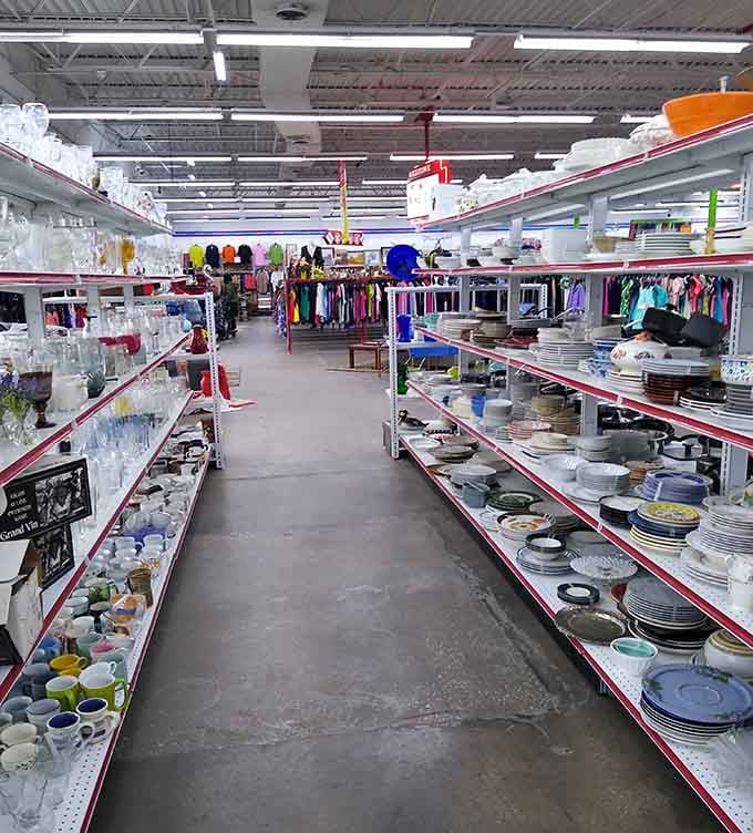 Inside, those red-trimmed shelves create organized aisles of dishes and treasures waiting to be discovered by savvy shoppers.