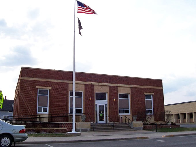 The American flags flutter proudly along Shawano's main street, where small-town values include keeping housing costs reasonable.