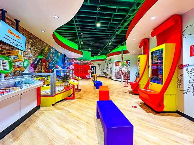 Inside, primary colors pop everywhere while displays celebrate the sugary treats that've made generations smile with pure joy.