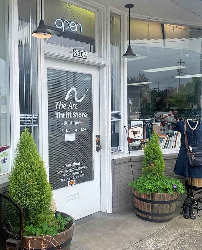 That elegant white-trimmed entrance with its vintage pendant lights welcomes you like an old friend bearing gifts.