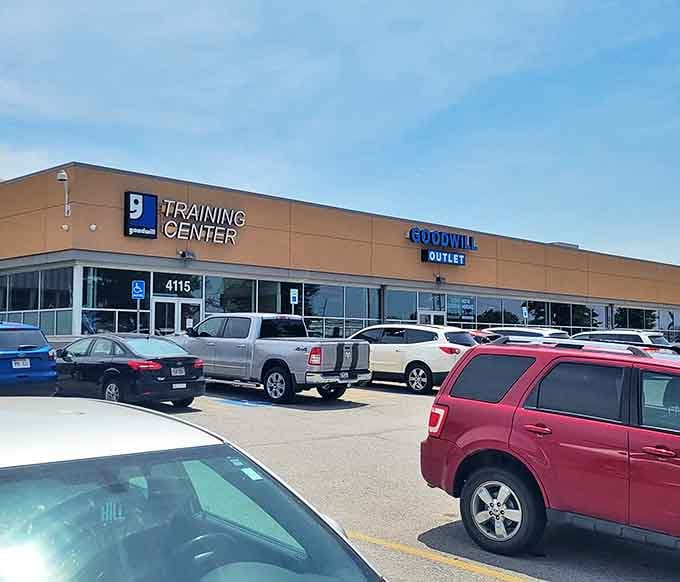 That packed parking lot tells you everything: serious bargain hunters know the outlet's pay-by-pound system is absolutely unbeatable.