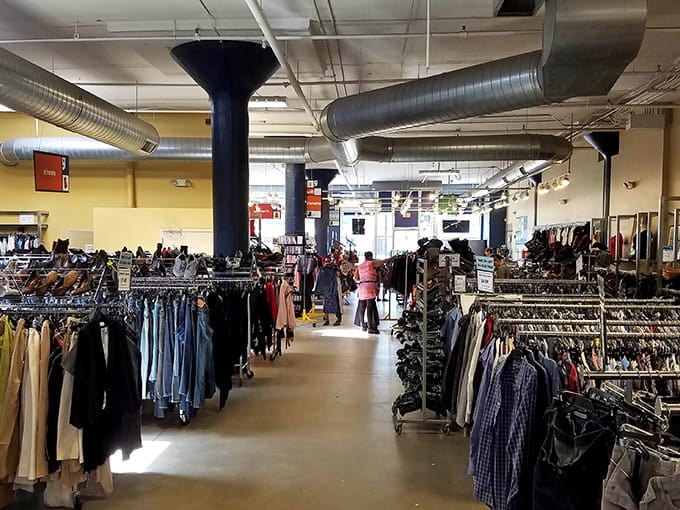 The industrial-chic interior with exposed columns creates a surprisingly stylish backdrop for hunting vintage treasures and modern bargains.