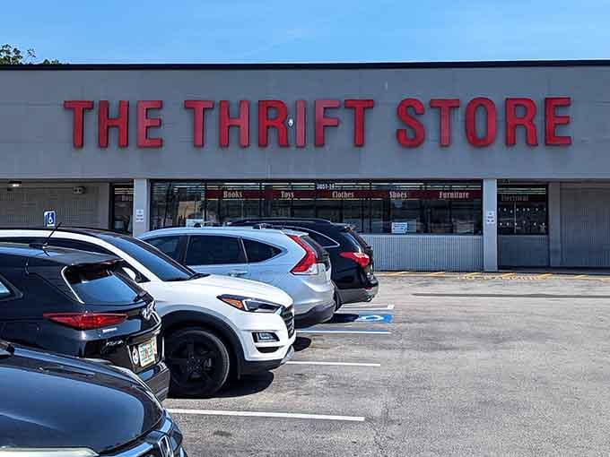 The Thrift Store's wide windows showcase their diverse inventory. Books, toys, clothes, and furniture all under one roof!