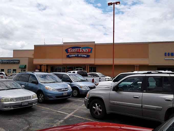 The packed parking lot on a cloudy day means dedicated bargain hunters never let weather stop their treasure-seeking missions.