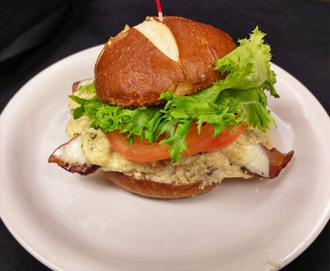 A burger on a pretzel bun topped with all the fixings makes lunchtime feel like a celebration.