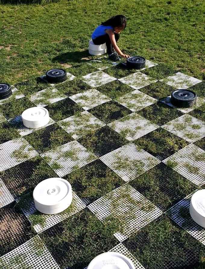 Giant checkers on real grass turns a classic game into a full-body experience that grandparents and grandkids enjoy equally.