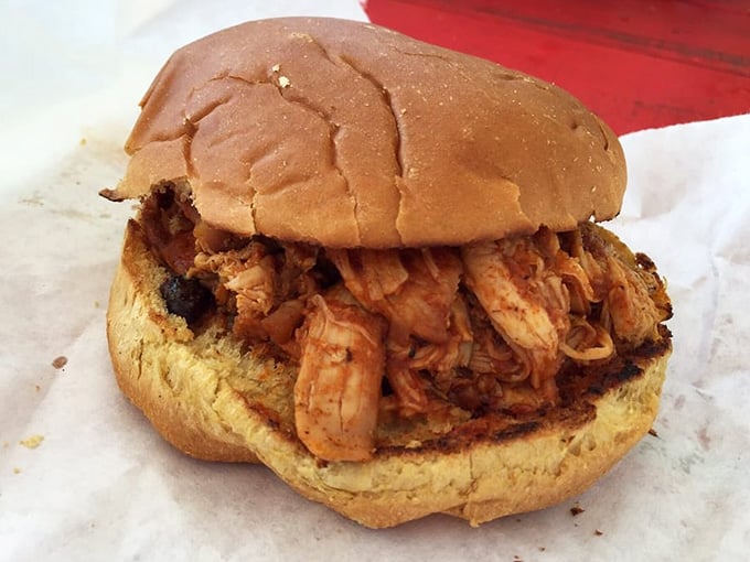 That sandwich is taller than some people's ambitions and infinitely more satisfying when you finally take the plunge.