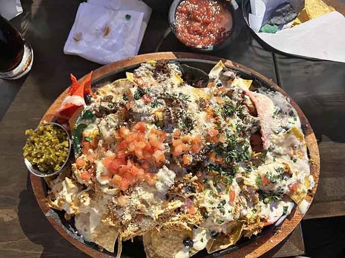 These loaded nachos could feed a small army or one very determined person with excellent priorities.