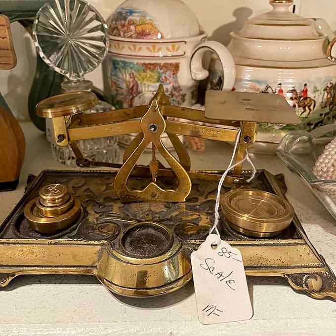Brass scales that once measured precious commodities now measure our fascination with the craftsmanship of yesteryear.