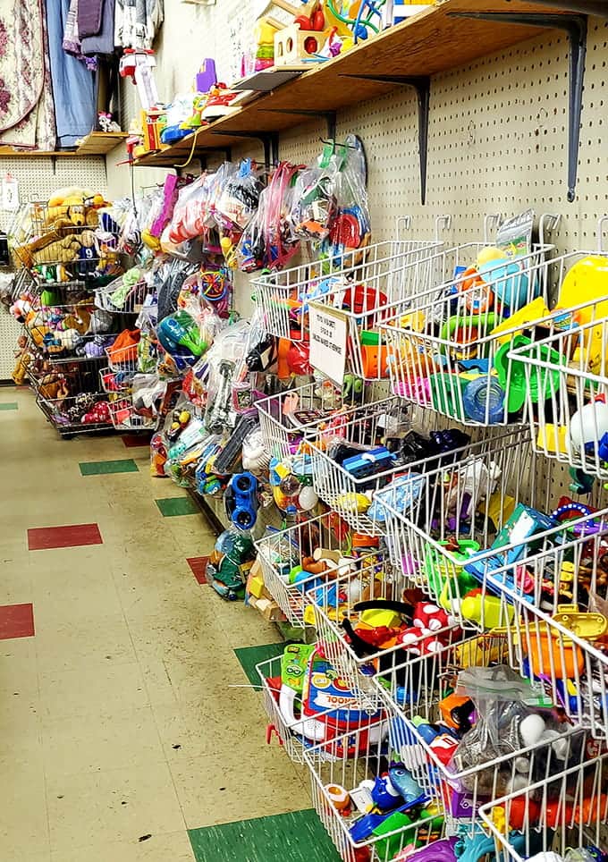Baskets brimming with toys that prove fun doesn't have an expiration date, just new owners to appreciate them.