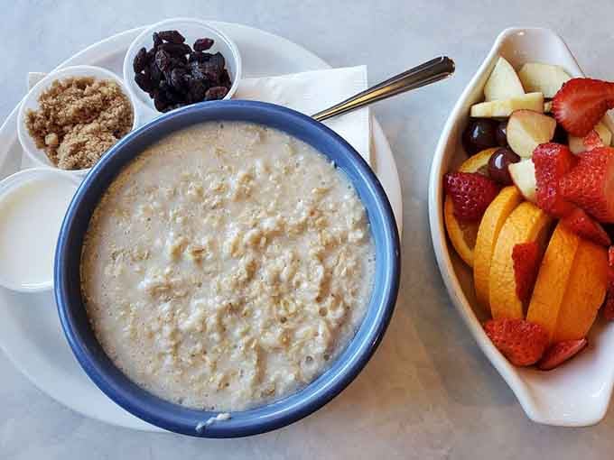Oatmeal served with fresh fruit and fixings shows that even healthy choices get the royal treatment here.