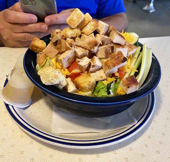 This grilled chicken salad is loaded with so much goodness, you'll forget you're eating something healthy.