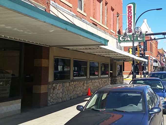 The Boondocks Cafe sign promises what every road-weary traveler hopes for: honest food served by people who'll remember your name and coffee preferences by your second visit.