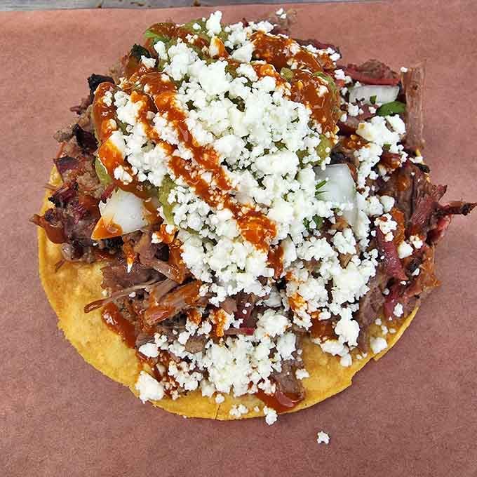 A tostada that doesn't know it's supposed to be Mexican&mdash;barbecue and cotija having a delicious cultural summit on a crispy corn disk.