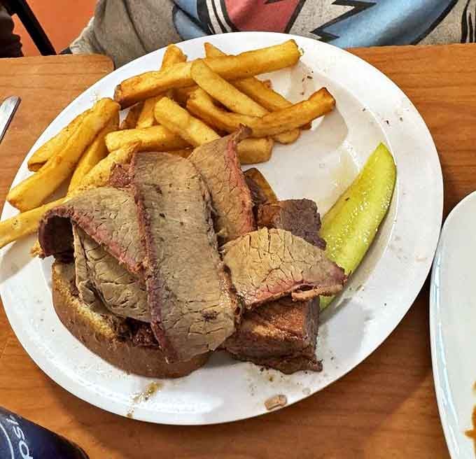 Brisket sliced thicker than a good mystery novel. The smoke ring tells a story of low and slow cooking that would make your grandfather proud.