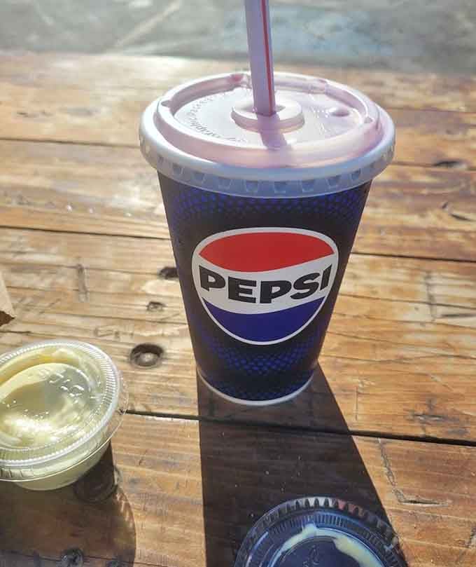 Sometimes the best moments in life involve a cold drink, a wooden table, and absolutely nowhere else to be.