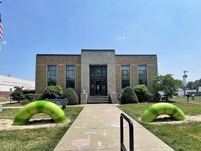 Even the library gets in on the fun with giant green attractions welcoming bookworms and curious visitors alike.