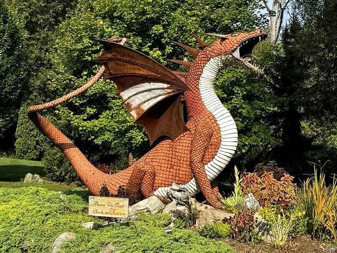 A dragon sculpture guards the gardens, finally answering the question: what's a castle without mythical creatures?