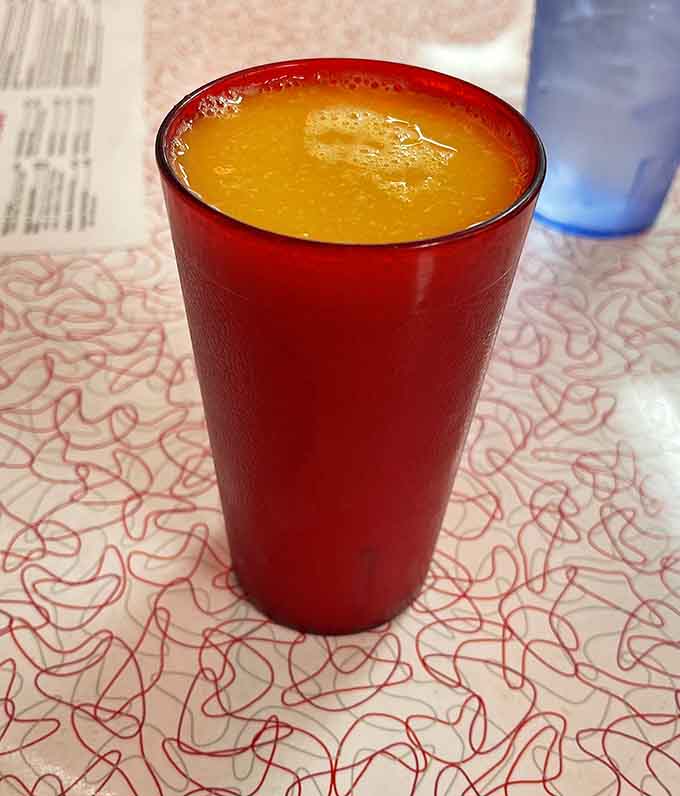 Fresh brewed iced tea in a proper red tumbler, because some traditions are worth keeping in this modern world.