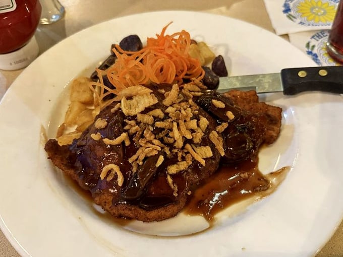 Crispy, golden schnitzel topped with fried onions because sometimes German cuisine is exactly what your soul needs right now.