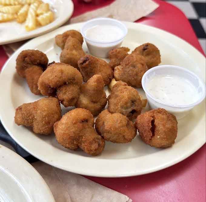 Fried mushrooms so perfectly golden, they could teach a masterclass in comfort food excellence.