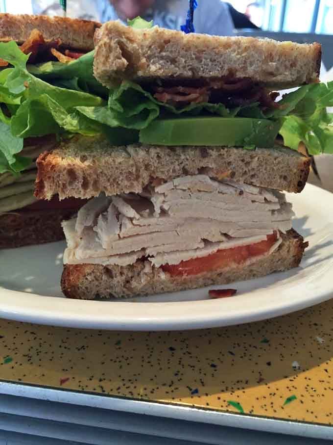 The club sandwich&mdash;mankind's greatest contribution to stacked food. Turkey, bacon, lettuce, and tomato between toasted bread is poetry on a plate.
