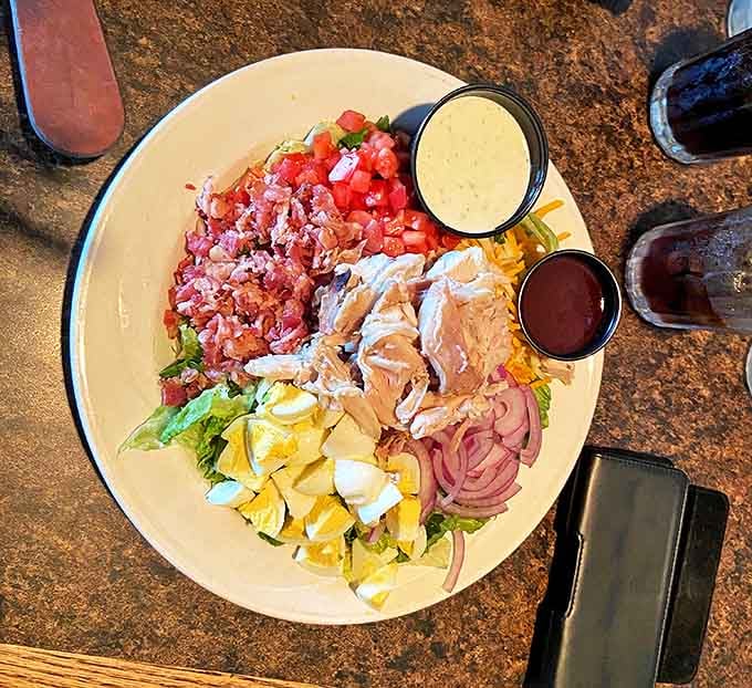 A Cobb salad that doesn't apologize for being beautiful, with each ingredient arranged like a colorful, edible mosaic.