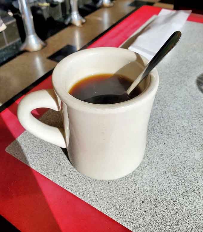 The humble diner mug&mdash;sturdy, unpretentious, and filled with coffee that doesn't need fancy Italian names to wake you up and set your day right.