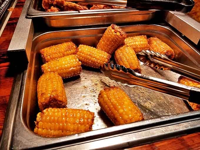 Corn on the cob glistening with buttery goodness. These golden nuggets are what summer dreams and stretchy pants were made for.