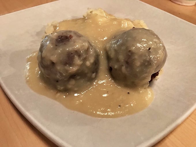 These meatballs look like they're floating in a pool of sauce that's been simmering since the Declaration of Independence was signed. Delaware comfort on a plate.