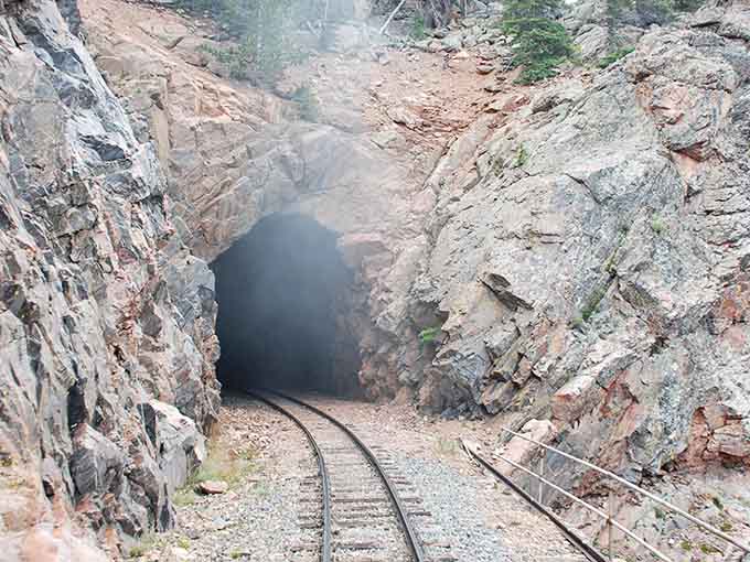 Rock tunnels carved by hand tools and determination create dramatic passages through mountains that seemed impossible to cross.