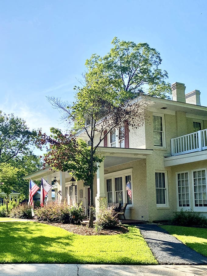 This classic Southern home with its pristine white columns and wraparound porch practically begs you to sit a spell with sweet tea in hand.