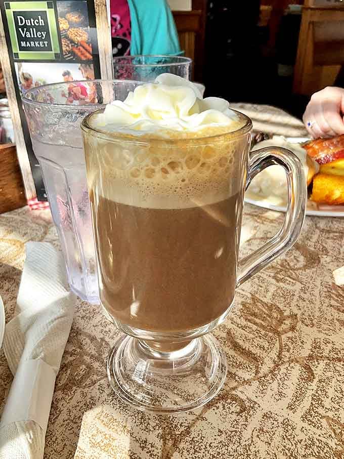 That cappuccino crowned with whipped cream looks like it could solve at least three of your current life problems.