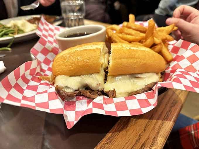 A French dip sandwich that's ready for its close-up&mdash;the melted cheese cascading over thinly sliced beef is the culinary equivalent of a warm hug.