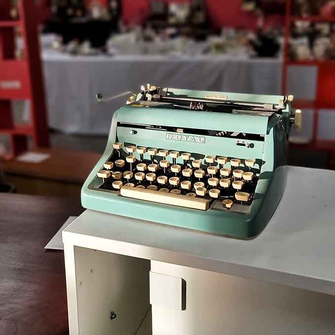 That mint-green typewriter is pure vintage gold, probably worth more than its tag suggests to the right collector.