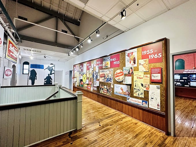 Walk through decades of Dr Pepper history on this timeline wall, where every era brought new ways to say "drink more soda."