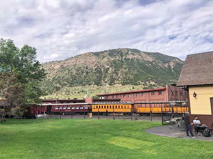 The depot grounds offer mountain views that remind you why people crossed continents to settle here.