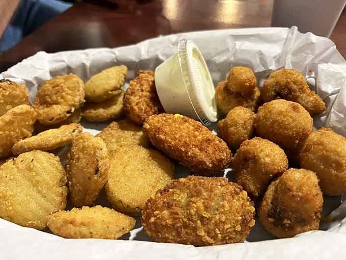 This golden trio of fried pickles, peppers, and mushrooms proves everything tastes better after a hot oil bath.