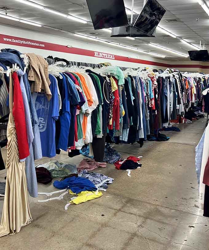 Rows of shirts organized by color make browsing feel less like work and more like a rainbow expedition.
