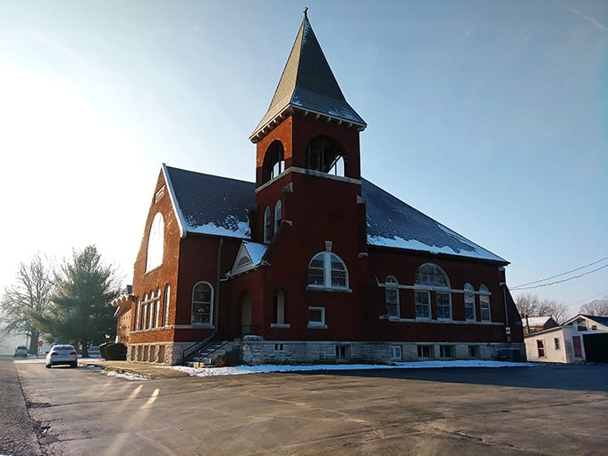 This brick church has witnessed generations of weddings, funerals, and Sunday best &ndash; its bell tower reaching skyward like a community's shared prayer.