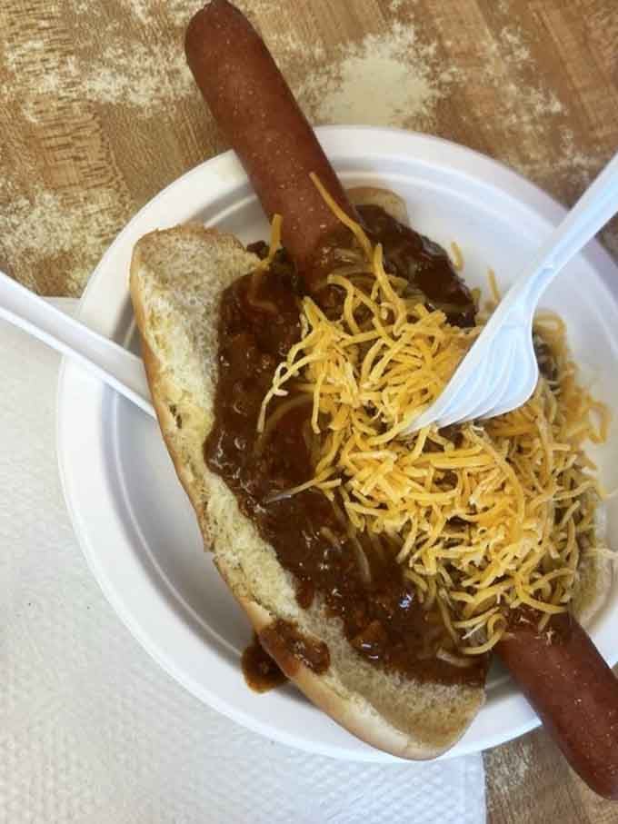 A foot-long hot dog buried under chili and cheese, because subtlety is overrated and your cardiologist isn't invited to lunch.
