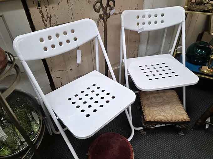 Folding chairs that survived decades of church basements, family reunions, and questionable potluck decisions without complaint.