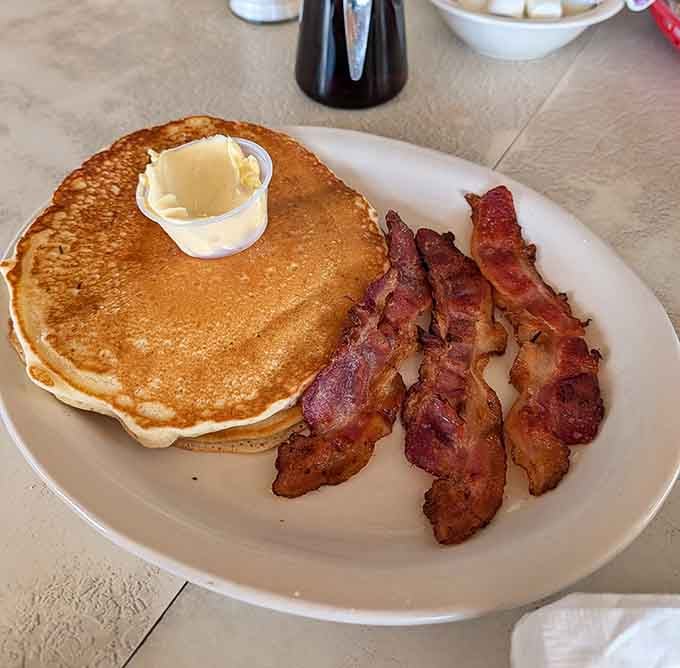 Golden pancakes and bacon strips that prove sometimes the classics become classics for very good reasons indeed.